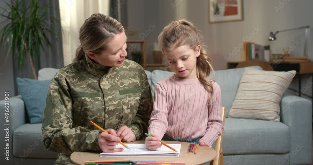 Military mother drawing with daughter during free time Stock Video ...