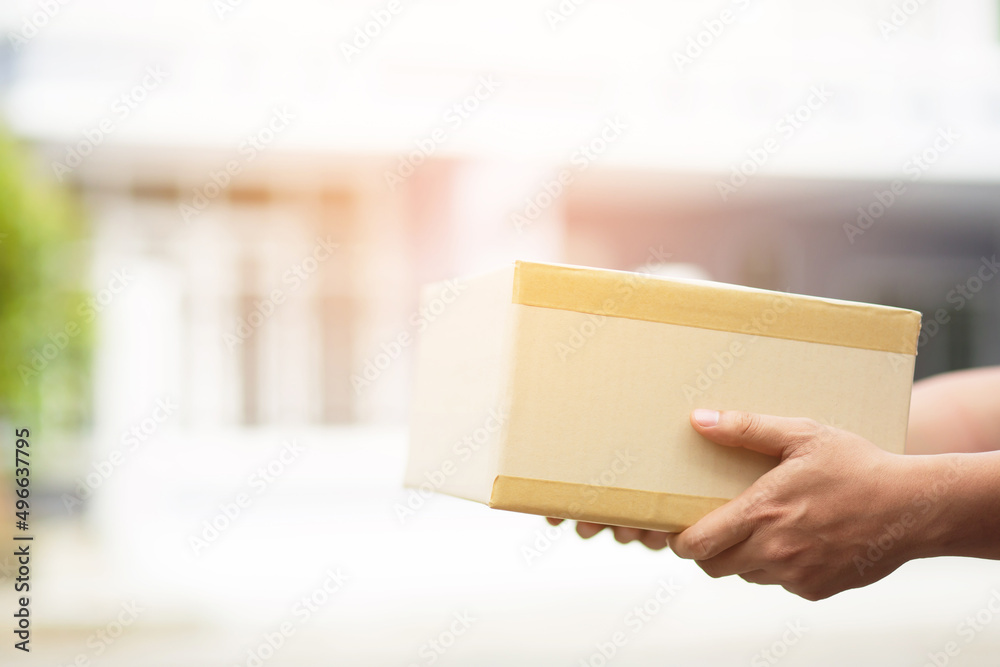 parcel delivery man wear protective gloves blue and mask, protect ...