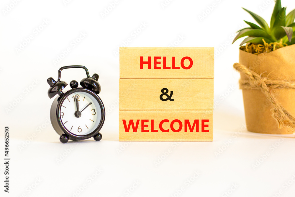 Hello and welcome symbol. Concept words Hello and welcome on wooden ...
