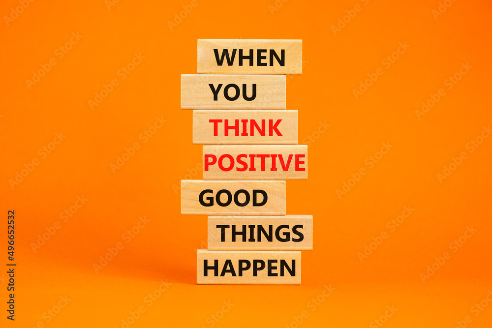 Think positive symbol. Wooden blocks with concept words When you think ...