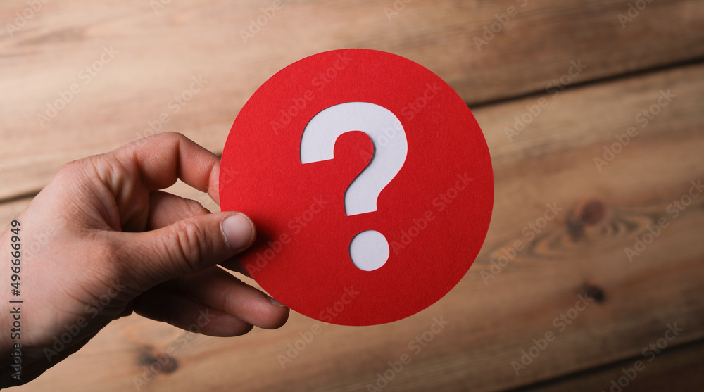 question marks on sheet of paper Stock Photo | Adobe Stock