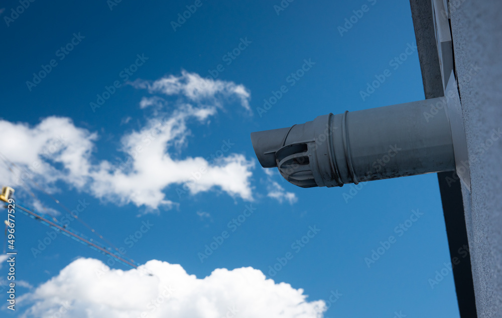 Apartment heating system. The chimney tube used for evacuation of the ...