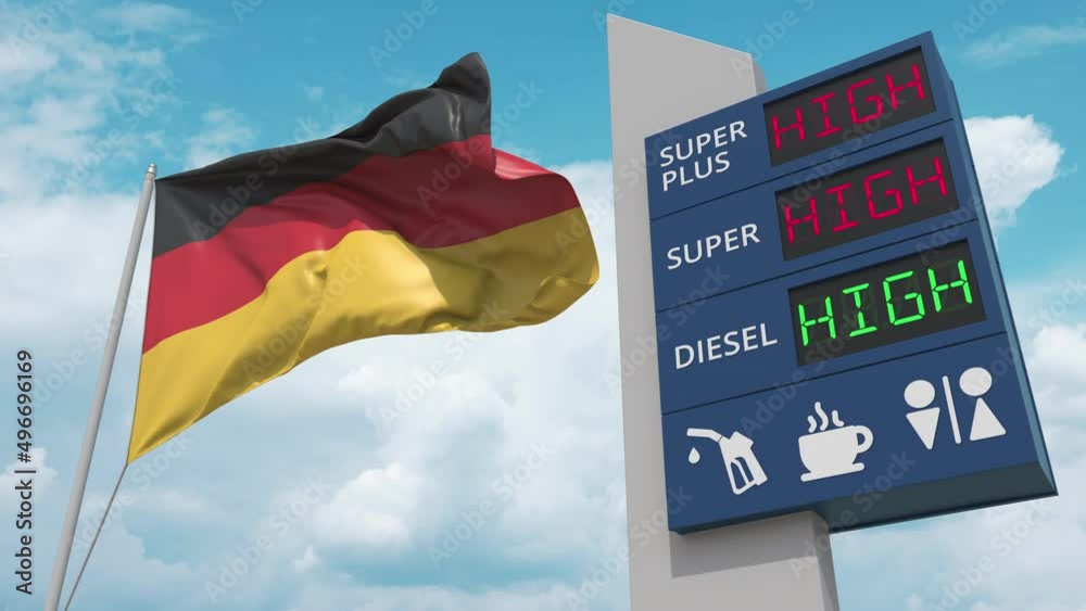 Gas station sign board with rising fuel prices and national flag of ...