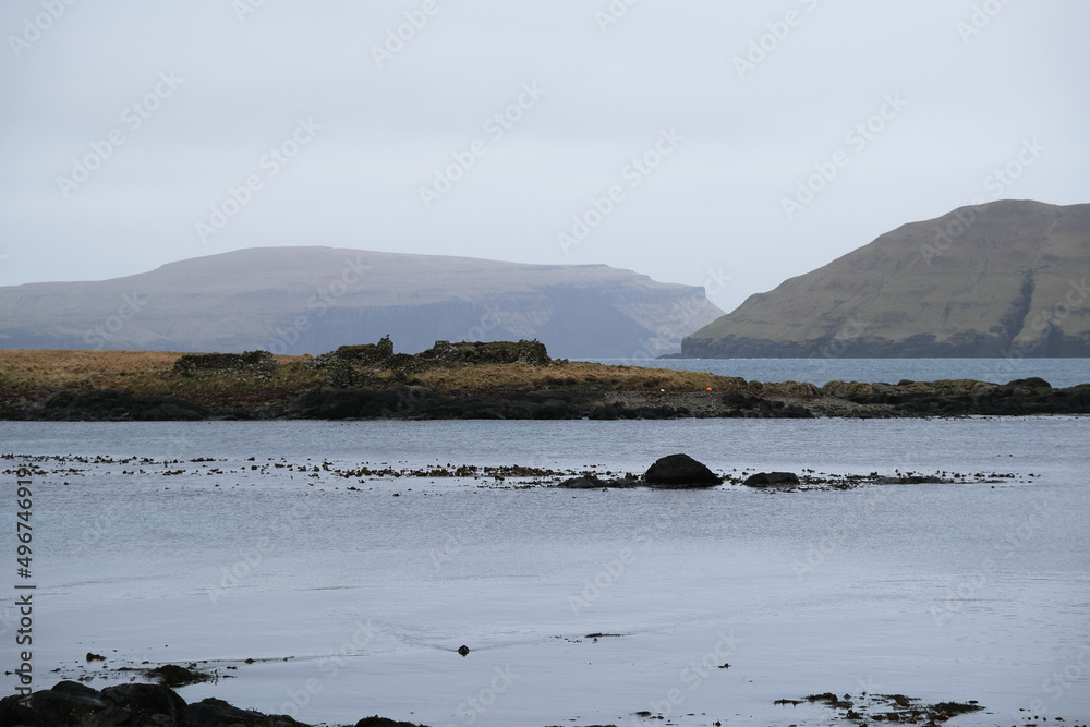 Faroese landmark Ólavskirkjan in medieval village Kirkjubøur Kirkjubour ...