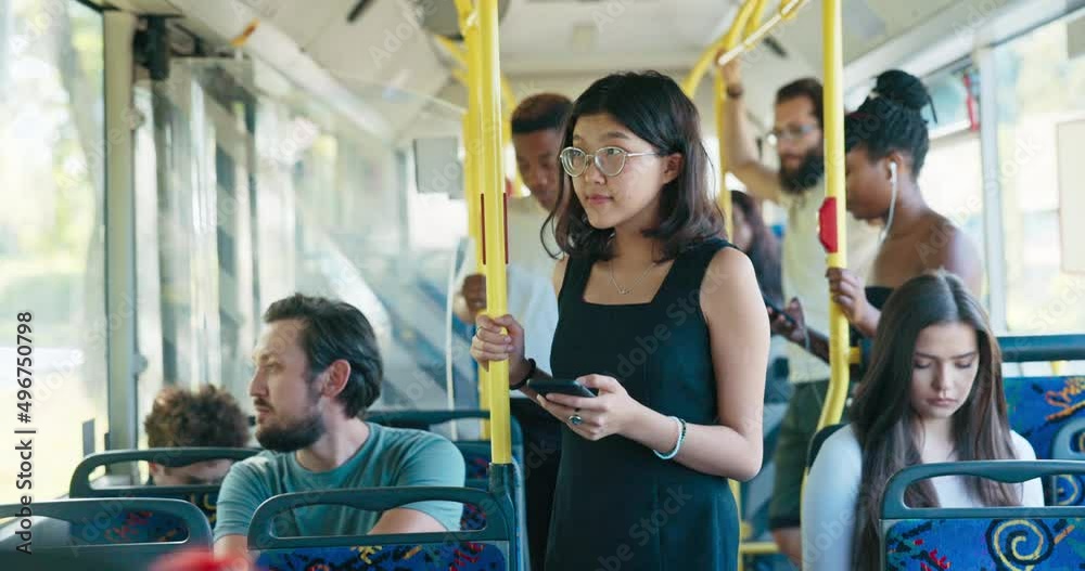 Bus stands at downtown bus stop woman with glasses taking public ...