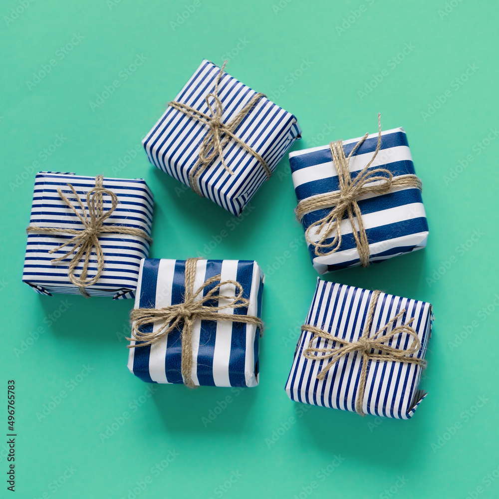 Blue background with boxes in a gift wrap Stock Photo | Adobe Stock