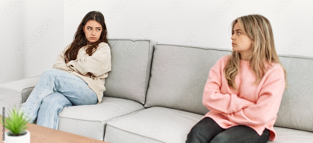 Young couple angry sitting on the sofa in silence at home. Stock Photo ...