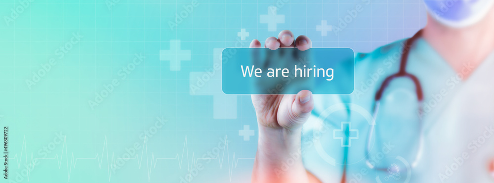 We are hiring. Doctor holds virtual card in hand. Medicine digital ...
