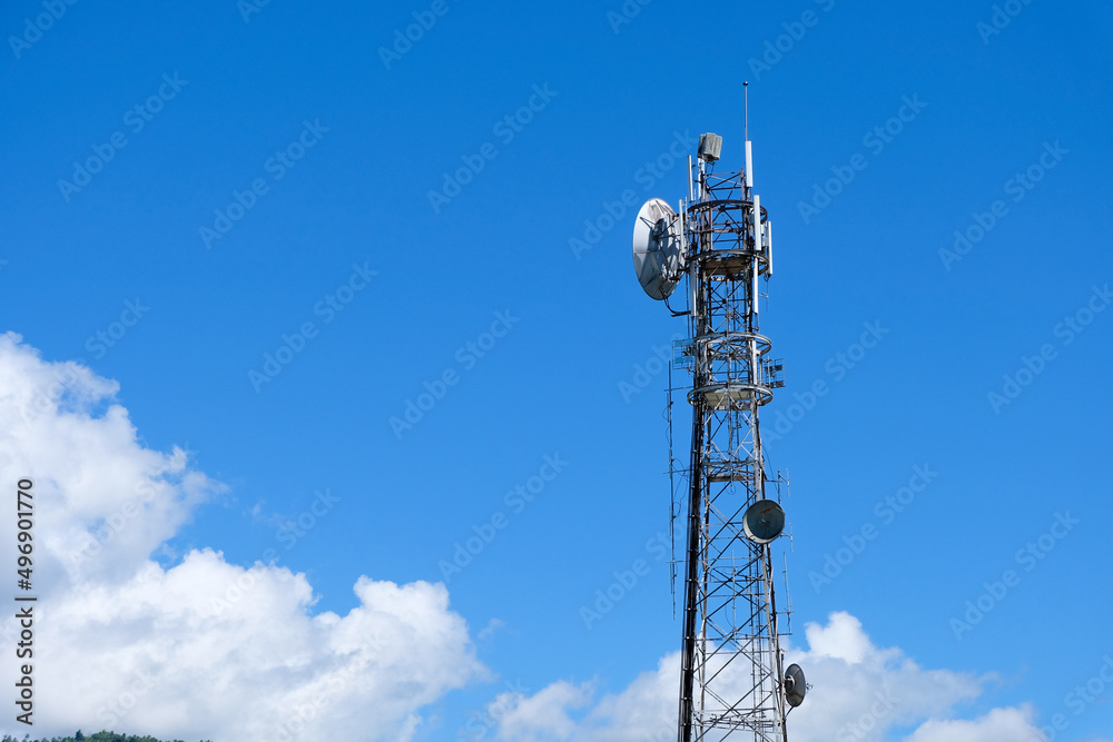 A solo transmitter communications antenna tower with satellites, modern ...