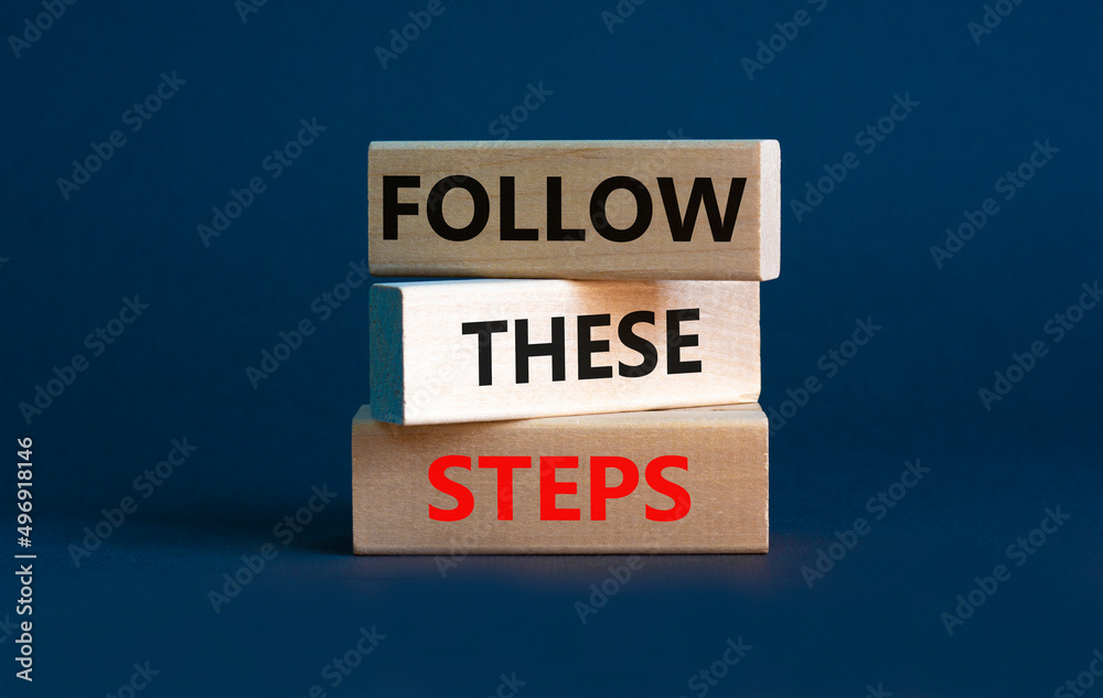 Follow these steps symbol. Concept words Follow these steps on wooden ...