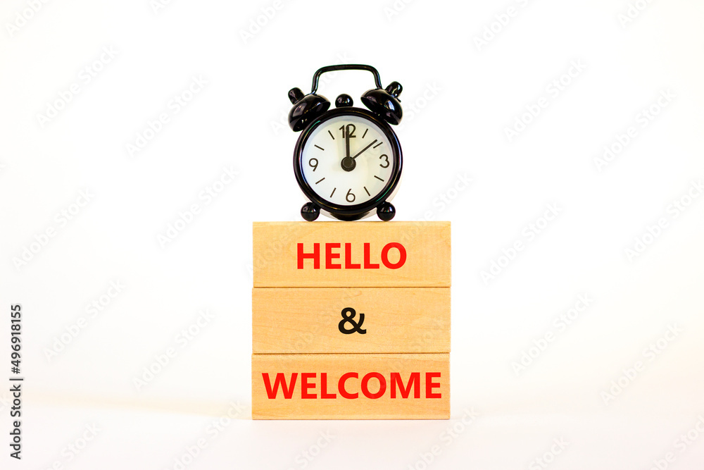 Hello and welcome symbol. Concept words Hello and welcome on wooden ...