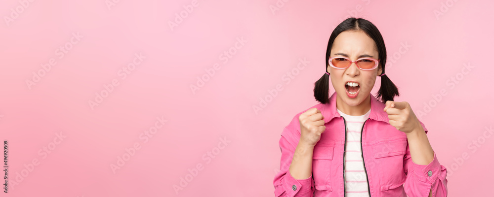 Image of angry, pissed off korean adult female model, shaking fists and ...