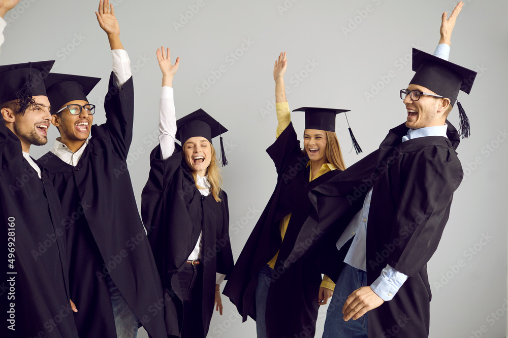 Hooray. Woohoo. We did it. Happy university students celebrating ...