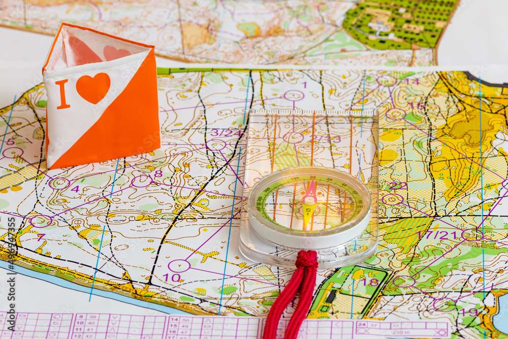 Sport orienteering. Symbols of the sport topographic map, compass with ...