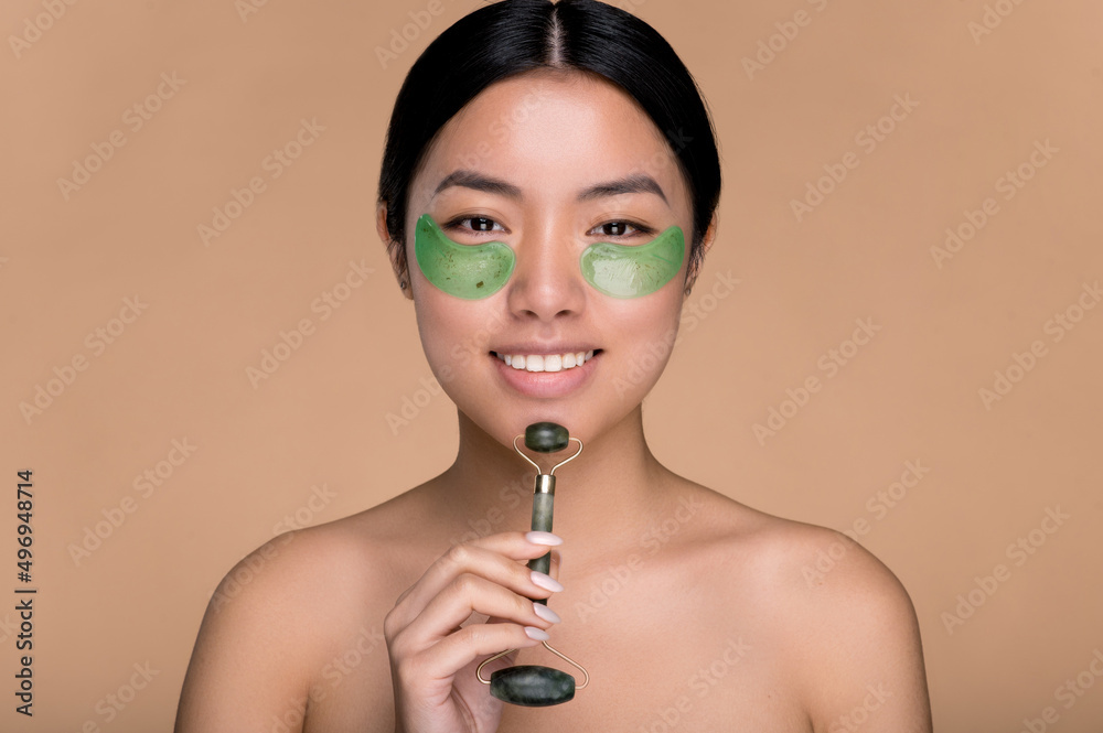 Beauty cosmetics procedures. Chinese girl with well-groomed skin, with ...
