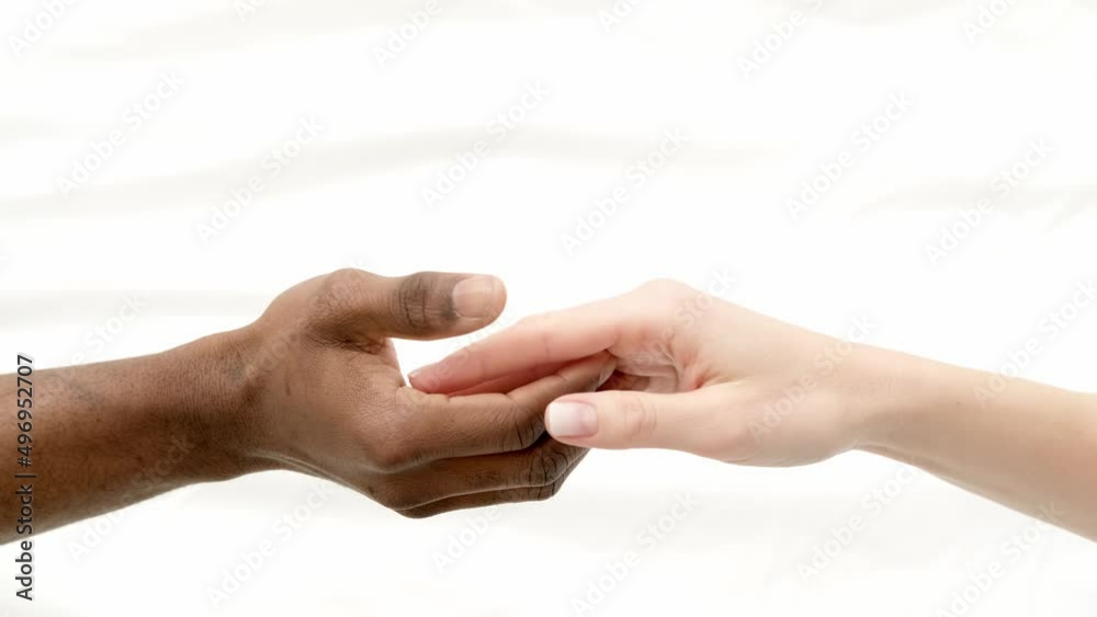 Hands close up multiracial couple african man and caucasian woman ...