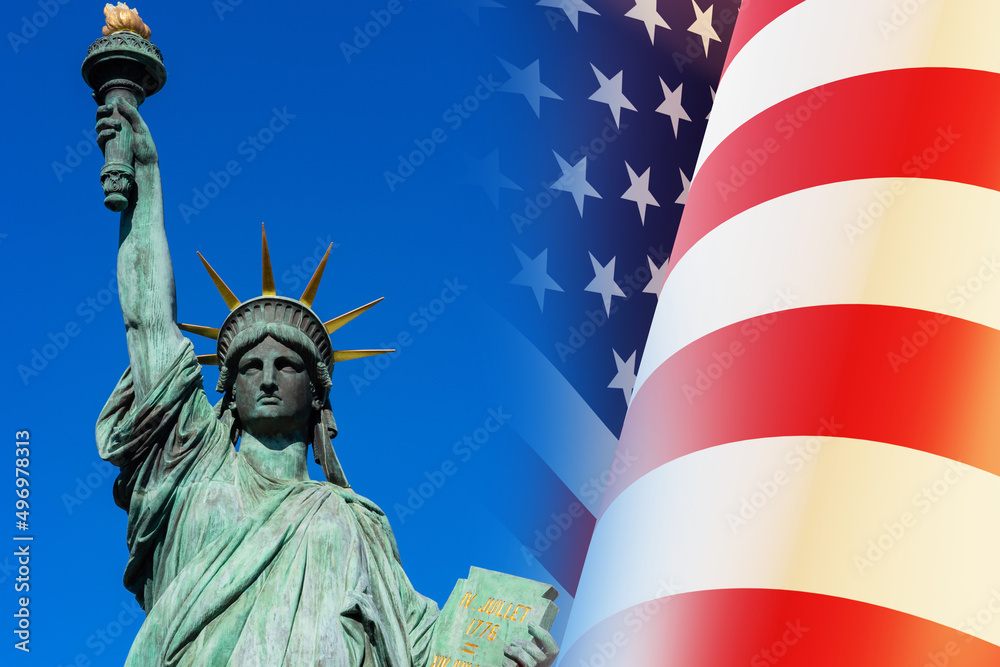 USA symbols on blue background. Statue of Liberty close up. USA flag is ...