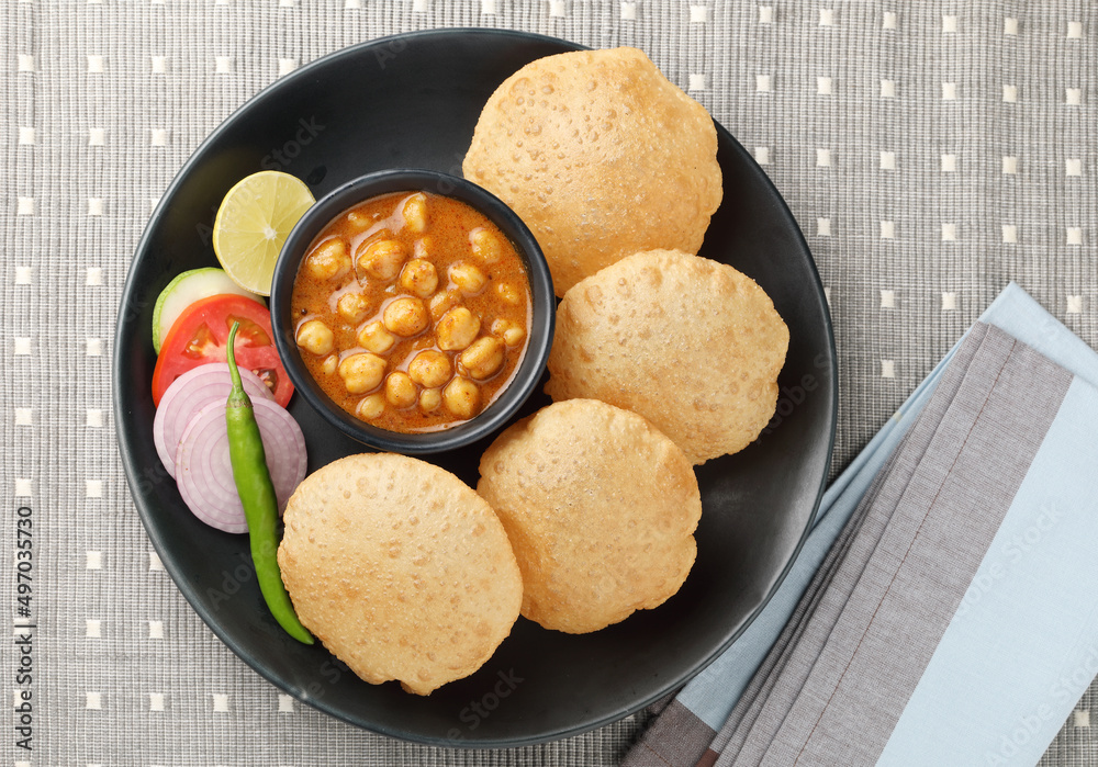 Puri and Chole traditional Indian food Indian dish spicy Chick Peas ...