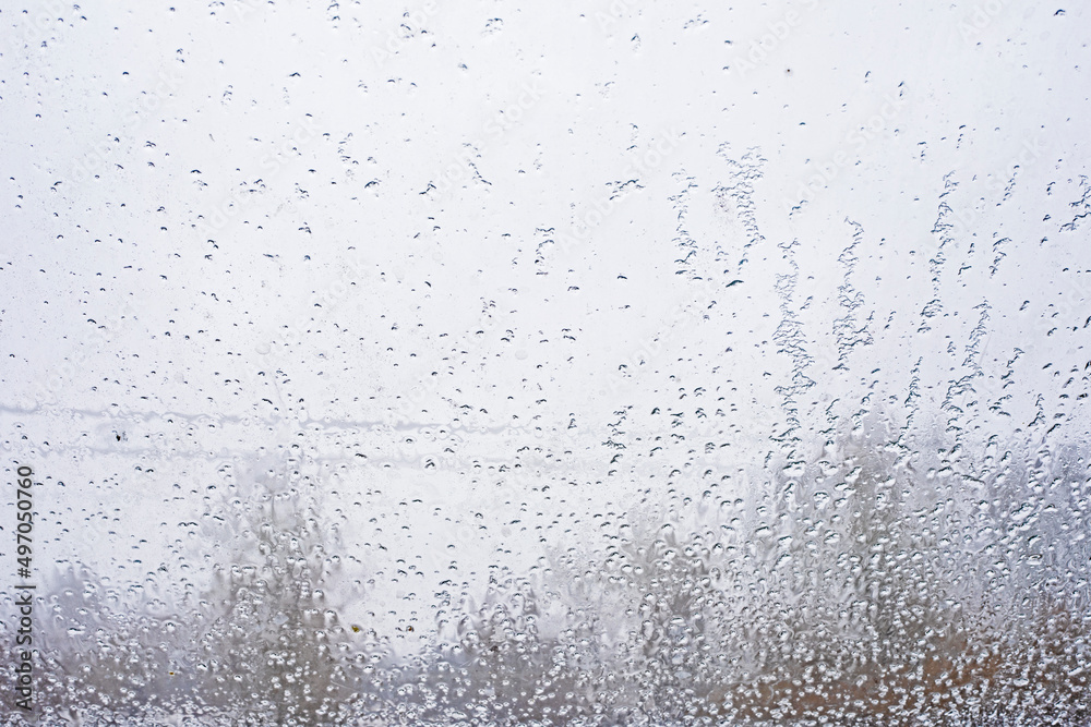 abstract blurred background of wet snow on the window, horizontal Stock ...