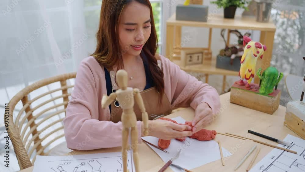 Asian Female artist an arttoys clay sculpture spend weekend day for her ...