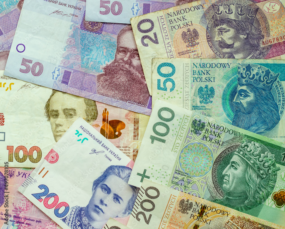Paper money, Ukrainian hryvnia and Polish zloty. Currency exchange for ...