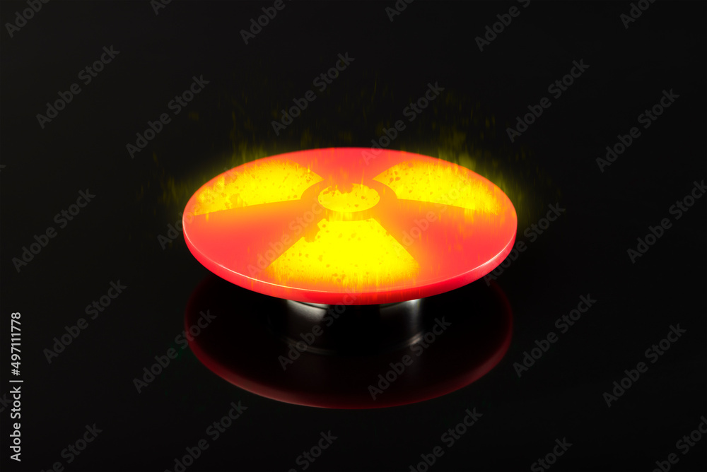 Big red button with the symbol of nuclear weapons on a black background ...