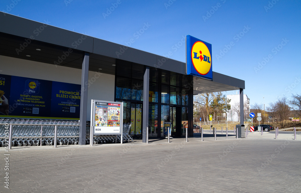 Lidl shop entrance, with brand logo signboard. German international ...