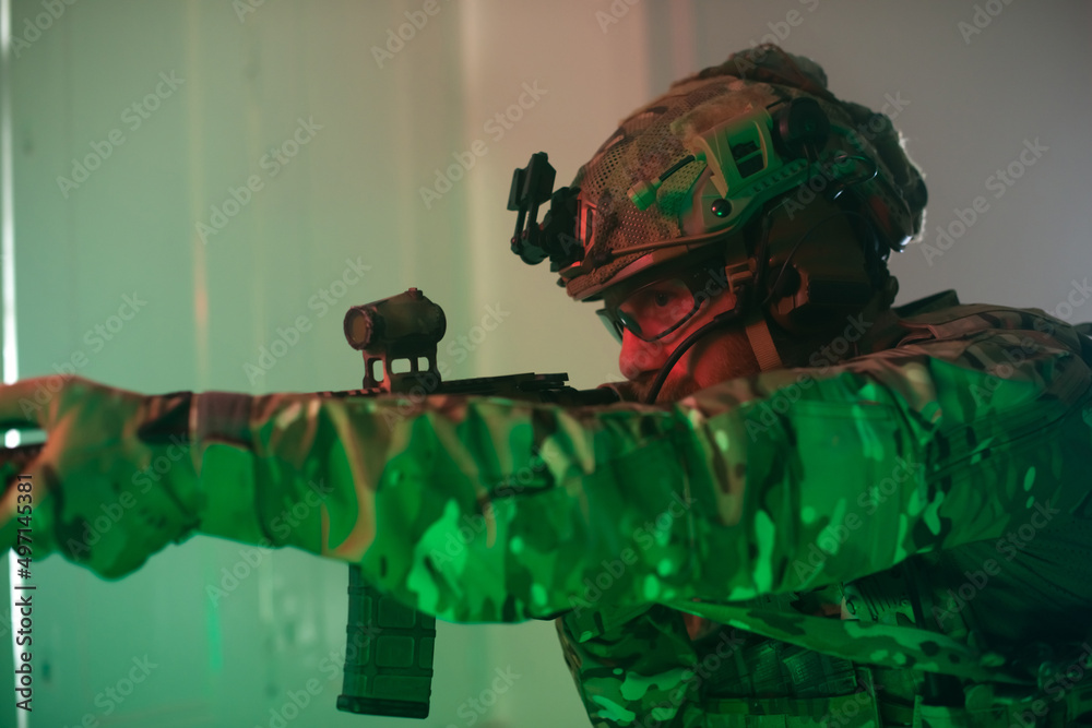 Enthusiastic man aiming with machinegun. Armed man firing shotgun ...