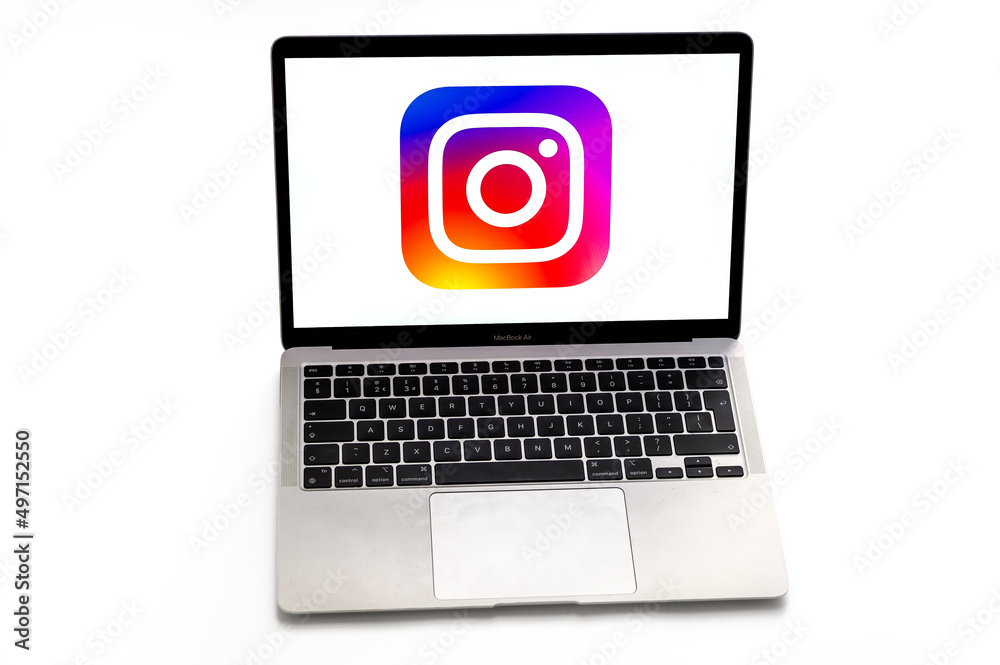 Instagram logo seen on laptop placed isolated on white background ...
