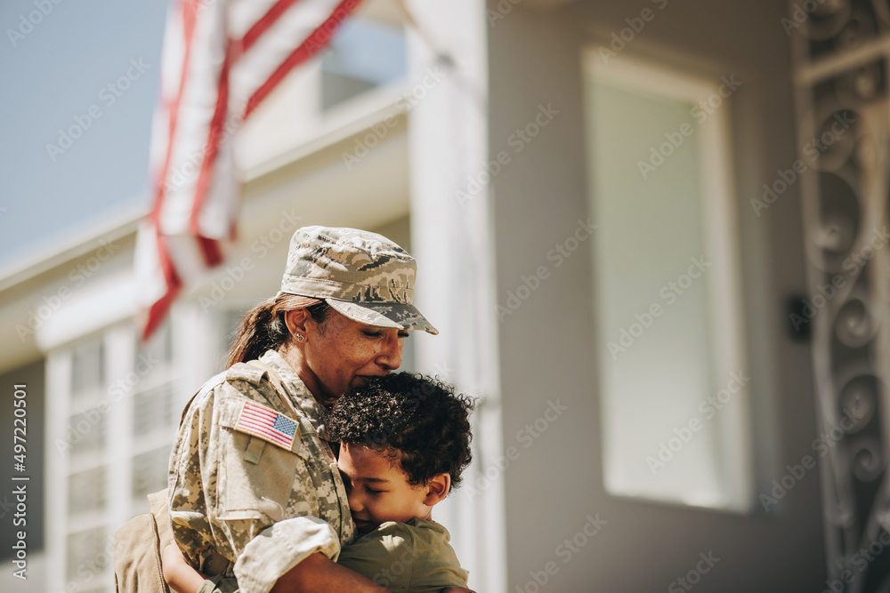 Photo & Art Print Mother and son reuniting after military deployment ...