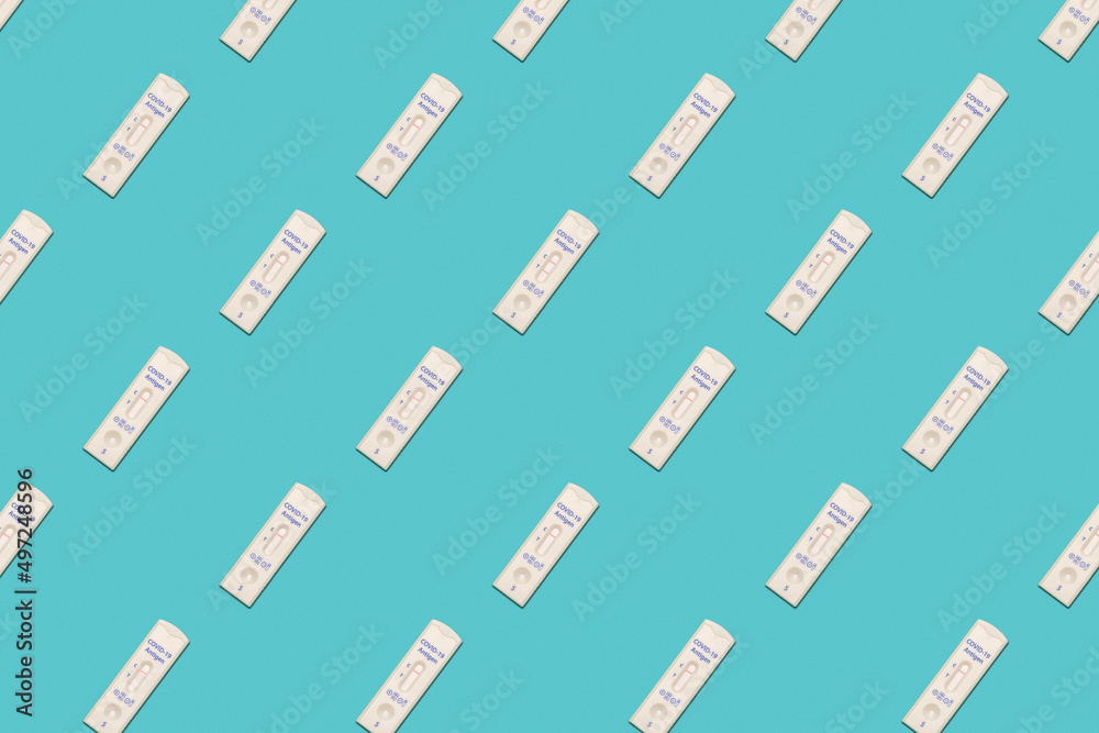 Rapid covid 19 antigen test, small plastic tester on light blue ...