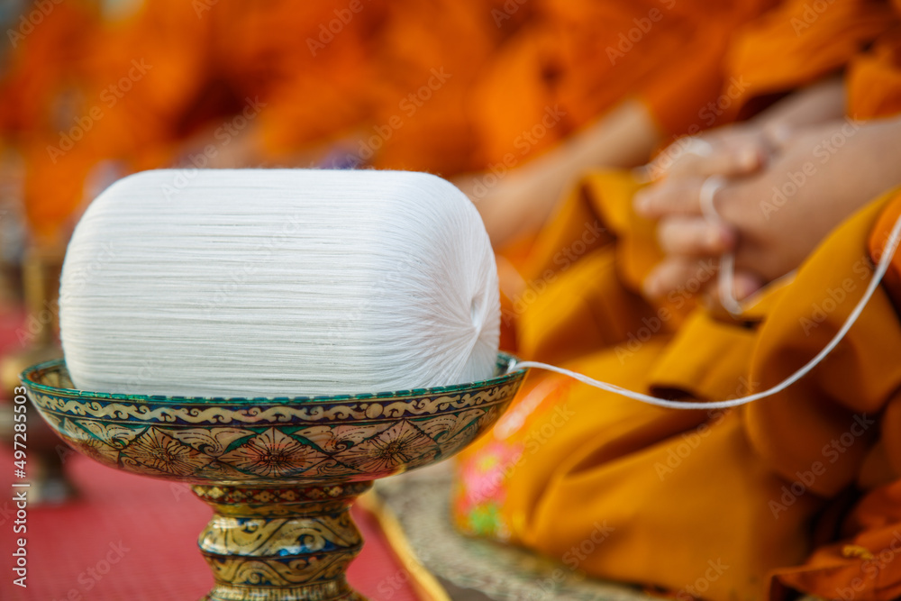 The holy thread on the pedestal linked to the monks during Buddhist ...