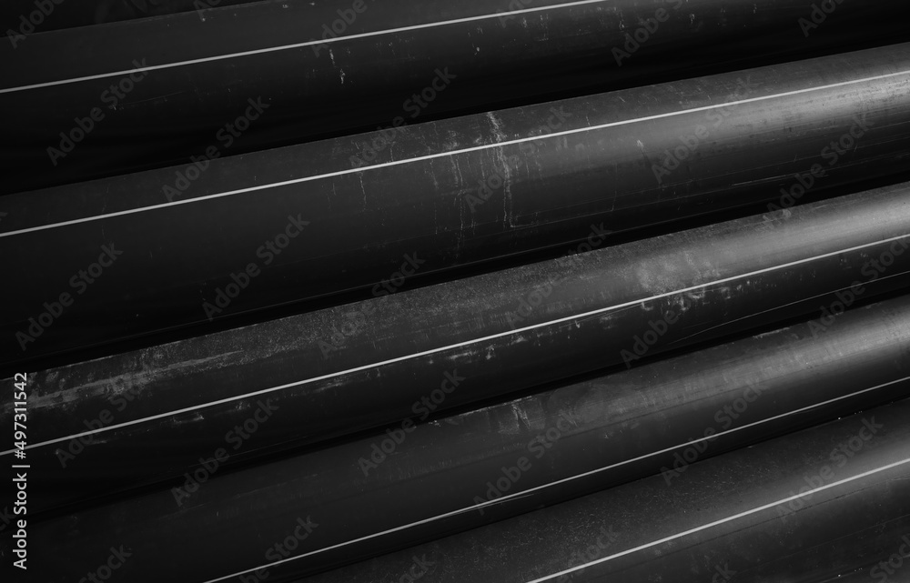 Diagonal construction water pipes background Stock Photo | Adobe Stock