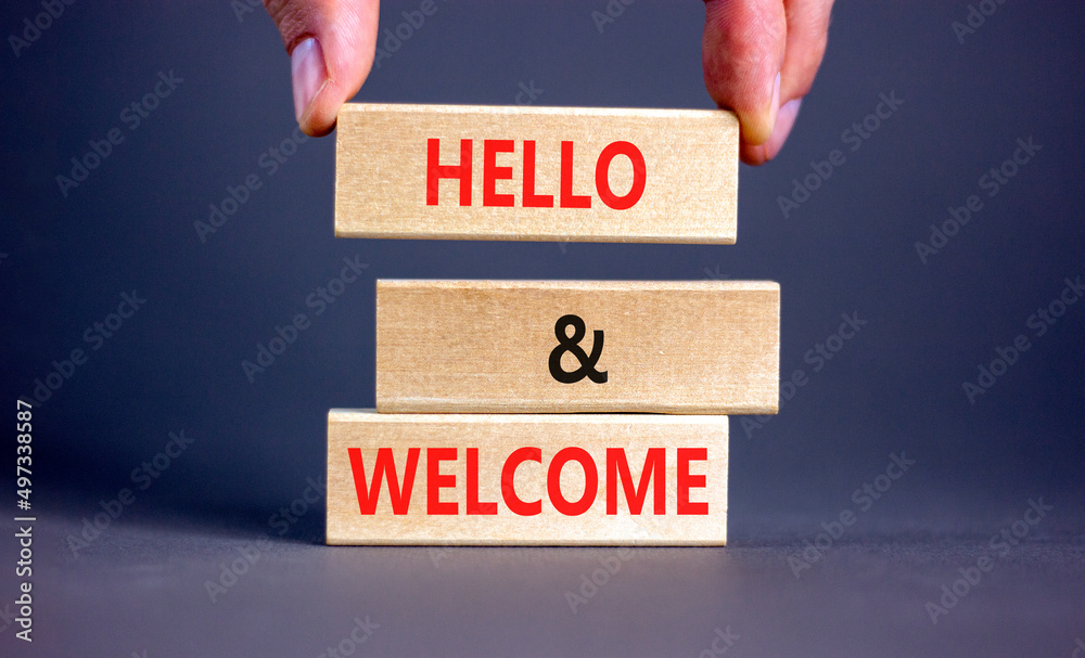 Hello and welcome symbol. Concept words Hello and welcome on wooden ...