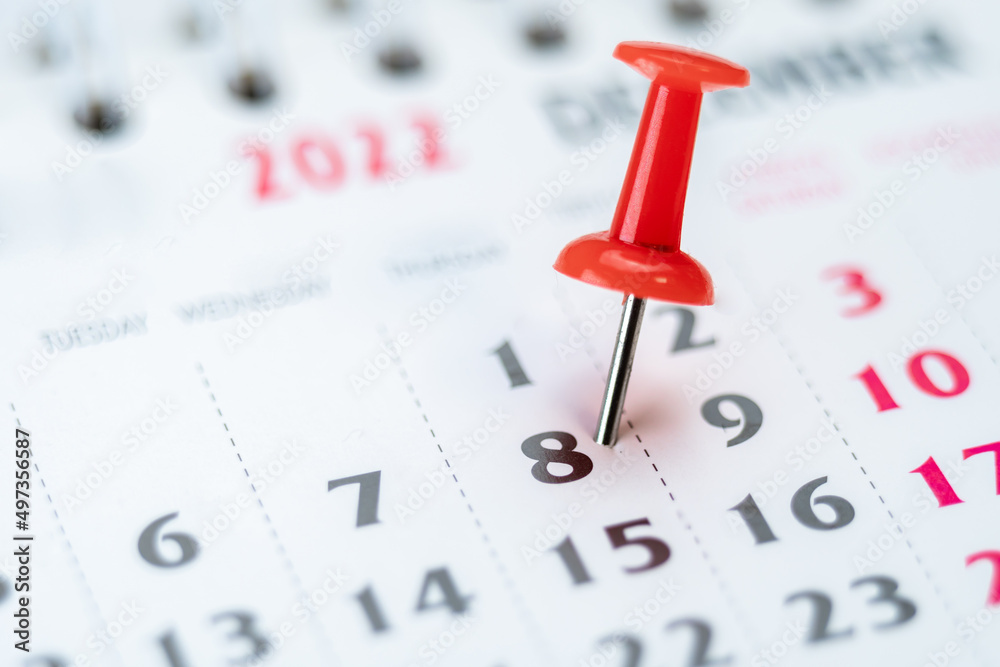 Red push pin on calendar 8th day of the month, mark the Event day with ...