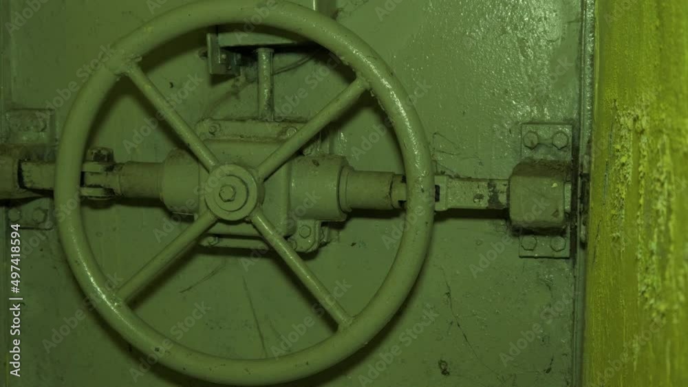 Steel door lock inside the concrete bomb shelter to hide civil people ...