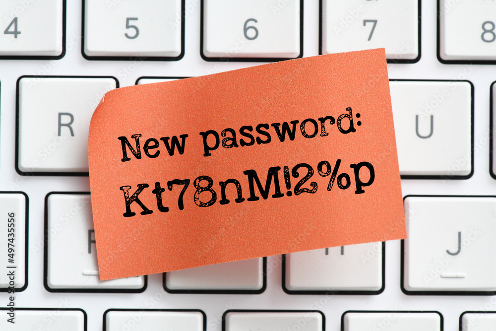 New strong password words on a red sheet of paper placed on a computer ...