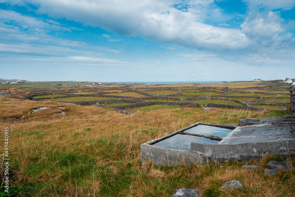 Nature scene of Inishmore,, Aran island. Rough stone terrain. Blue ...