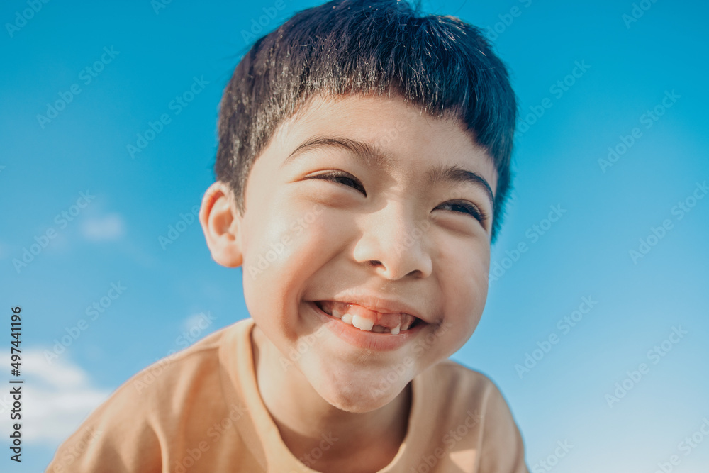 Happy Little Asian boy happy, Kid showing front teeth with big smile ...