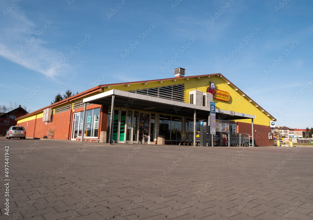 Biedronka supermarket shop with brand logo sign. Retail chain of ...