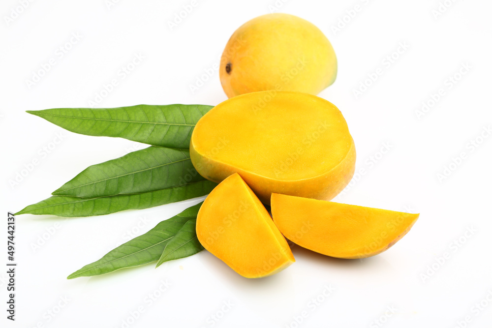 King of fruits; Alphonso Mango fruit with green leaf isolated on white ...