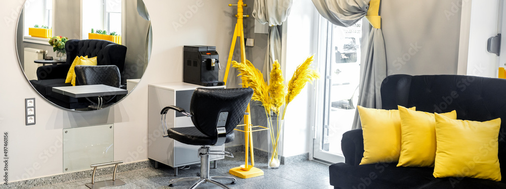 Modern small bright hair and beauty salon in black and yellow colors ...