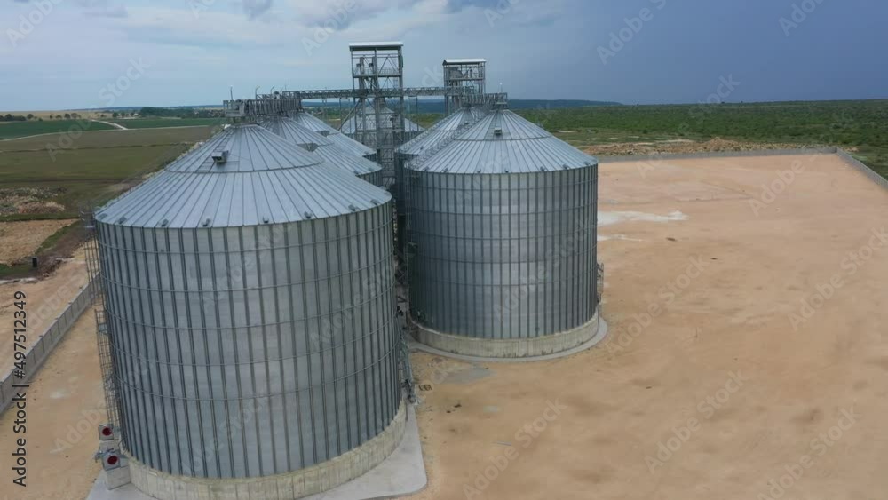 Stockvideon New industrial grain silos grain storage tanks from drone ...