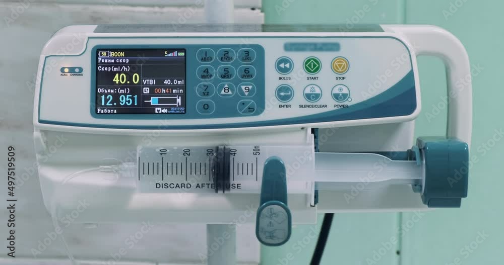 Working syringe infusion pump, dropper close-up. Infusion pump for ...