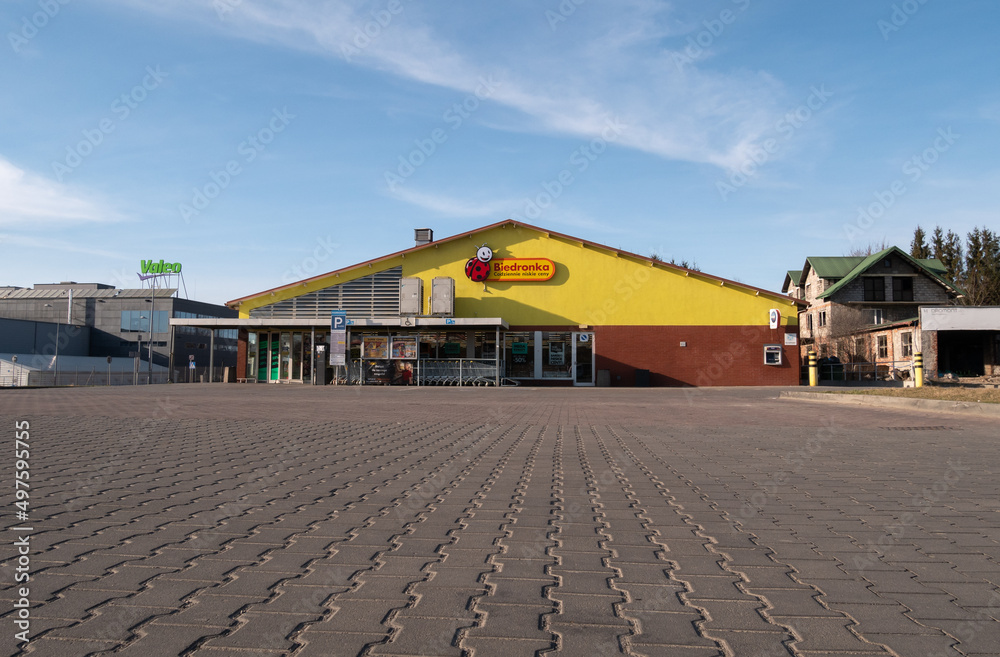 Biedronka supermarket shop with brand logo sign. Retail chain of ...