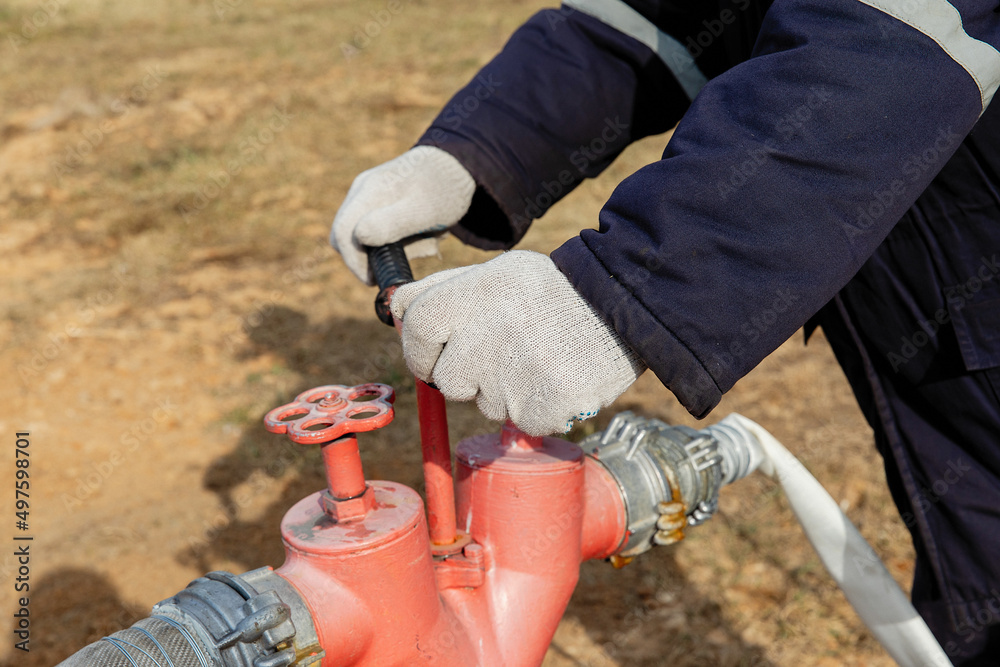 Fire hydrant column for fire extinguishing water supply. Connecting the ...