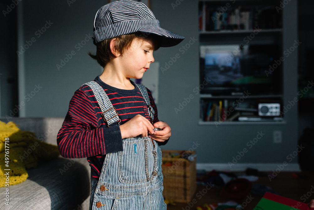 boy in conductor outfit Stock Photo | Adobe Stock