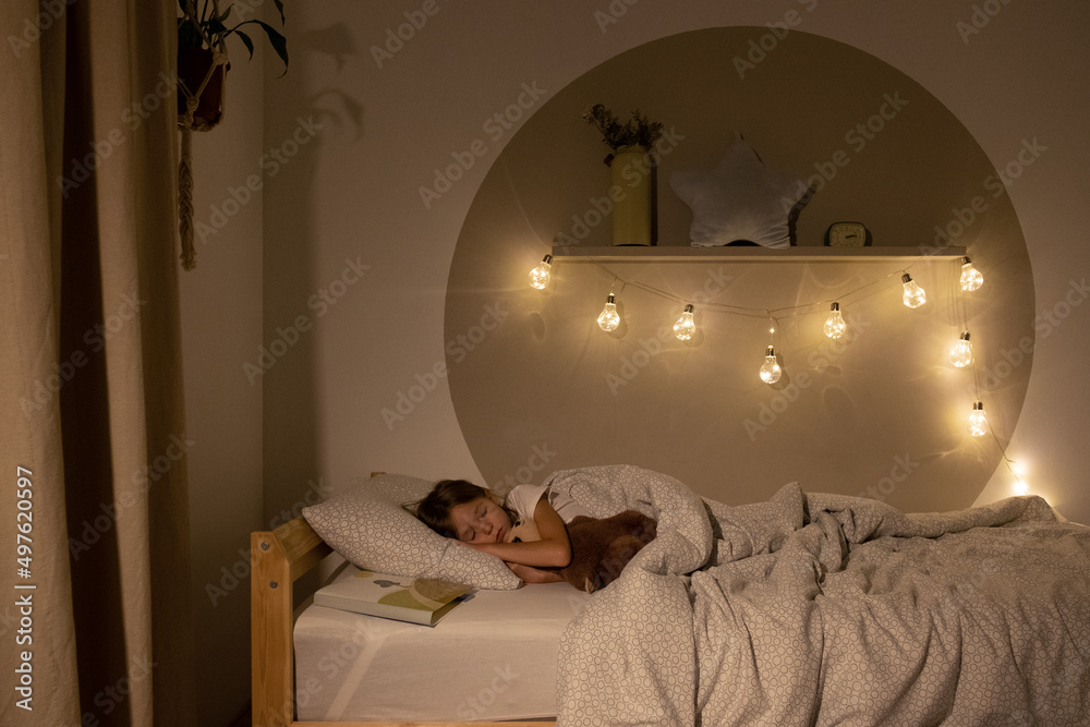 Child sleeping on bed at home Stock Photo | Adobe Stock