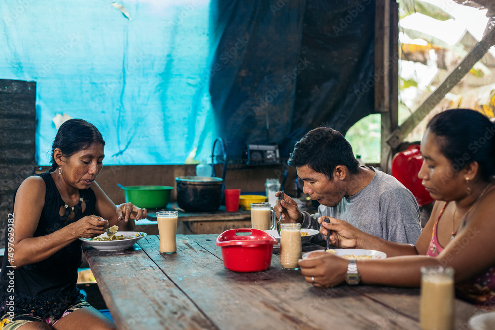 Peruvian family eating Creole food Stock Photo | Adobe Stock