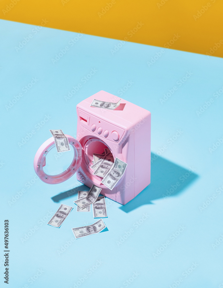 Washing Machine Washing Dollar Bills. Stock Photo | Adobe Stock